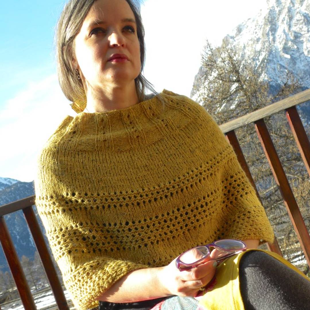 Schema Poncho ai Ferri Corallo | Modello di Emma Fassio